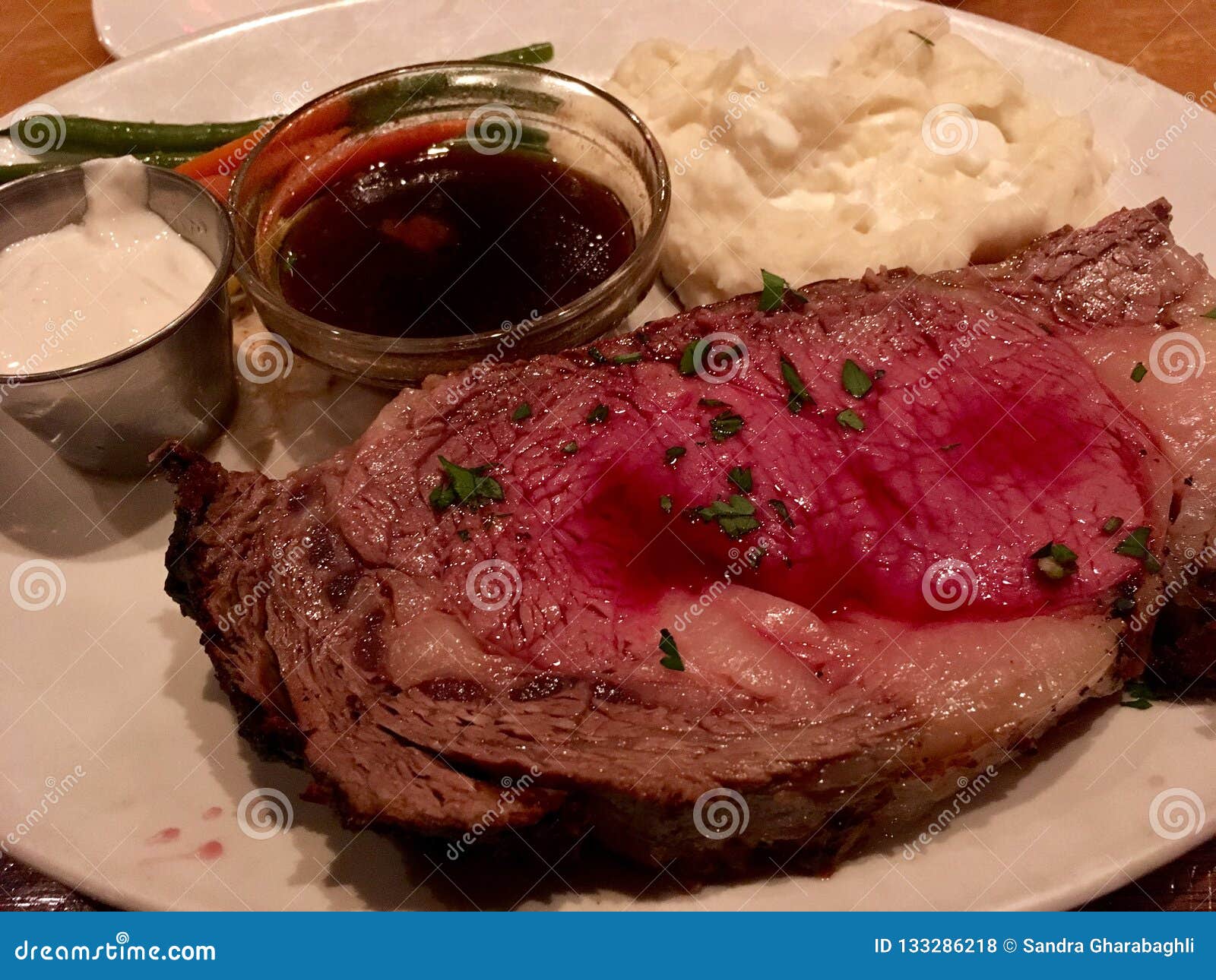 Rare Prime Rib stock photo. Image of rare, potatoes - 133286218