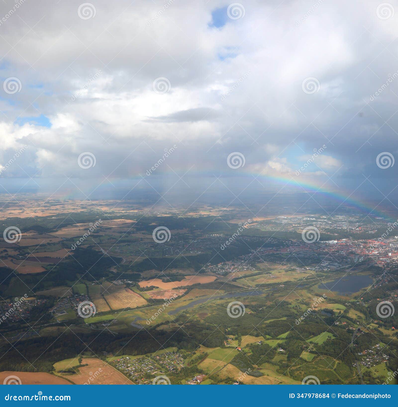 Rare View of the Rainbow from Above with the Plain and White Clouds ...