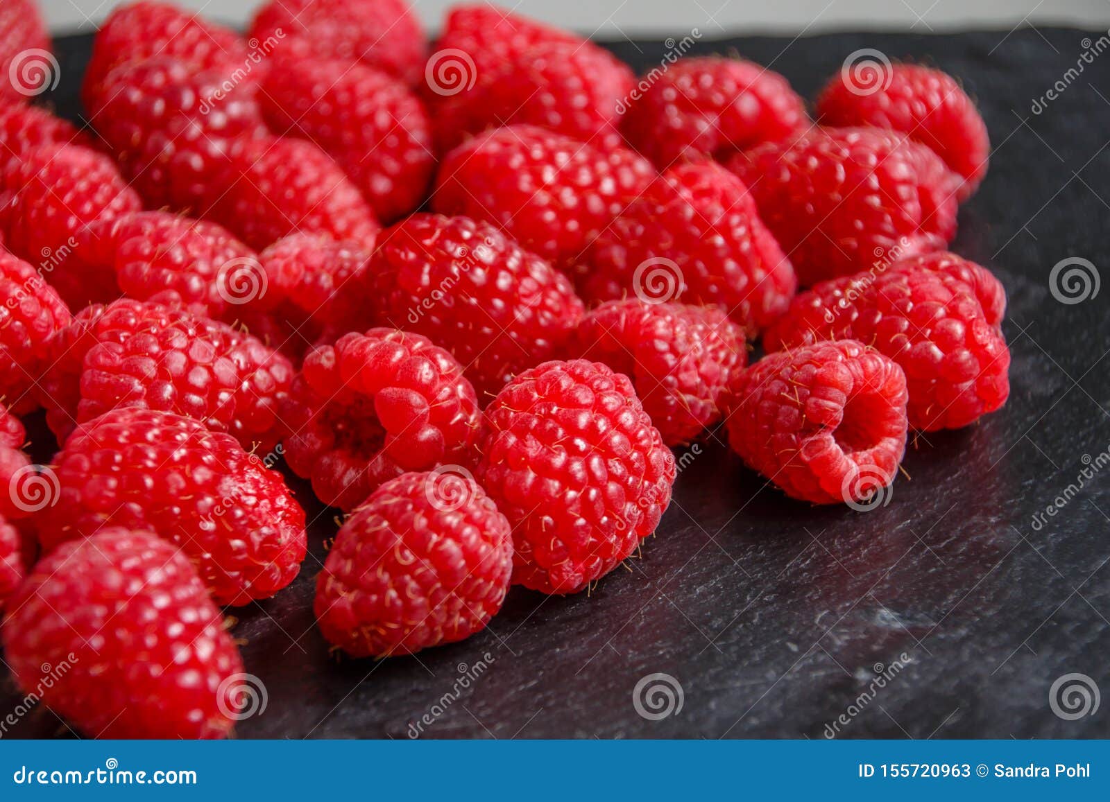 Raspberries on Black Slate Plate Stock Image - Image of vitamins ...