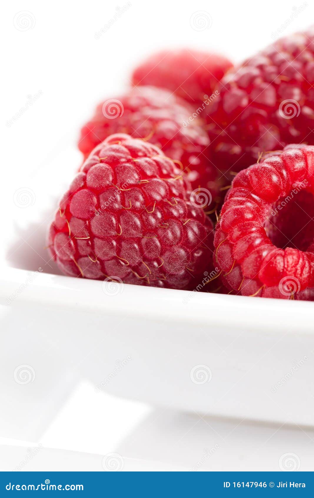 Raspberries in bowl stock photo. Image of macro, food - 16147946