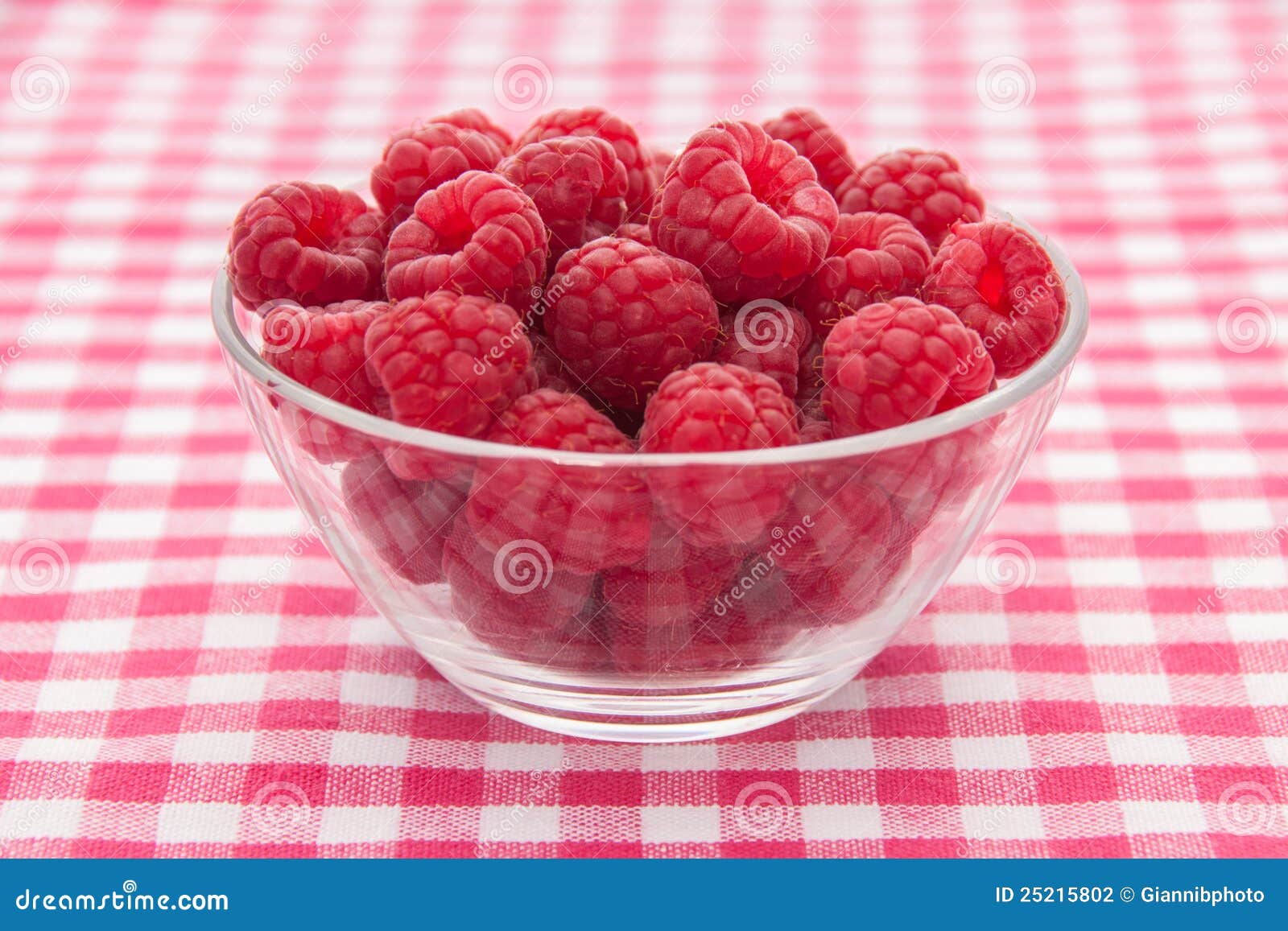 Raspberries in a bowl stock photo. Image of colorful - 25215802