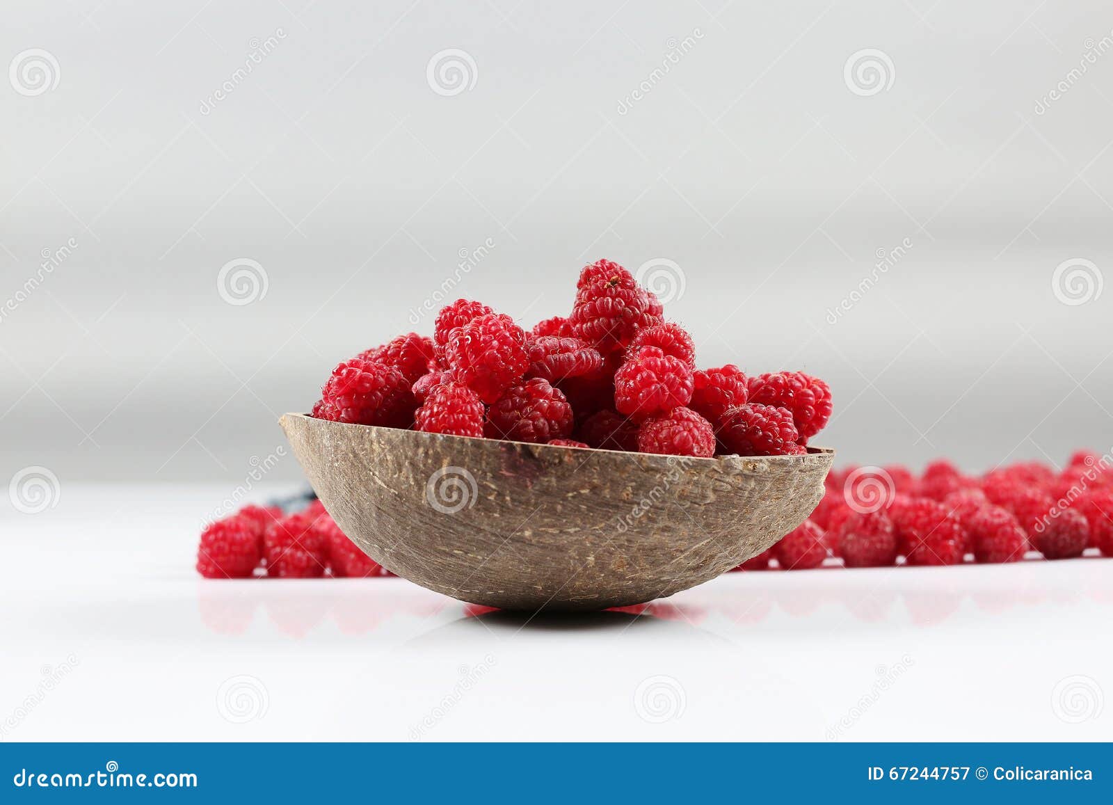 Raspberries in a Coconut Shell Stock Image - Image of strawberry, white ...