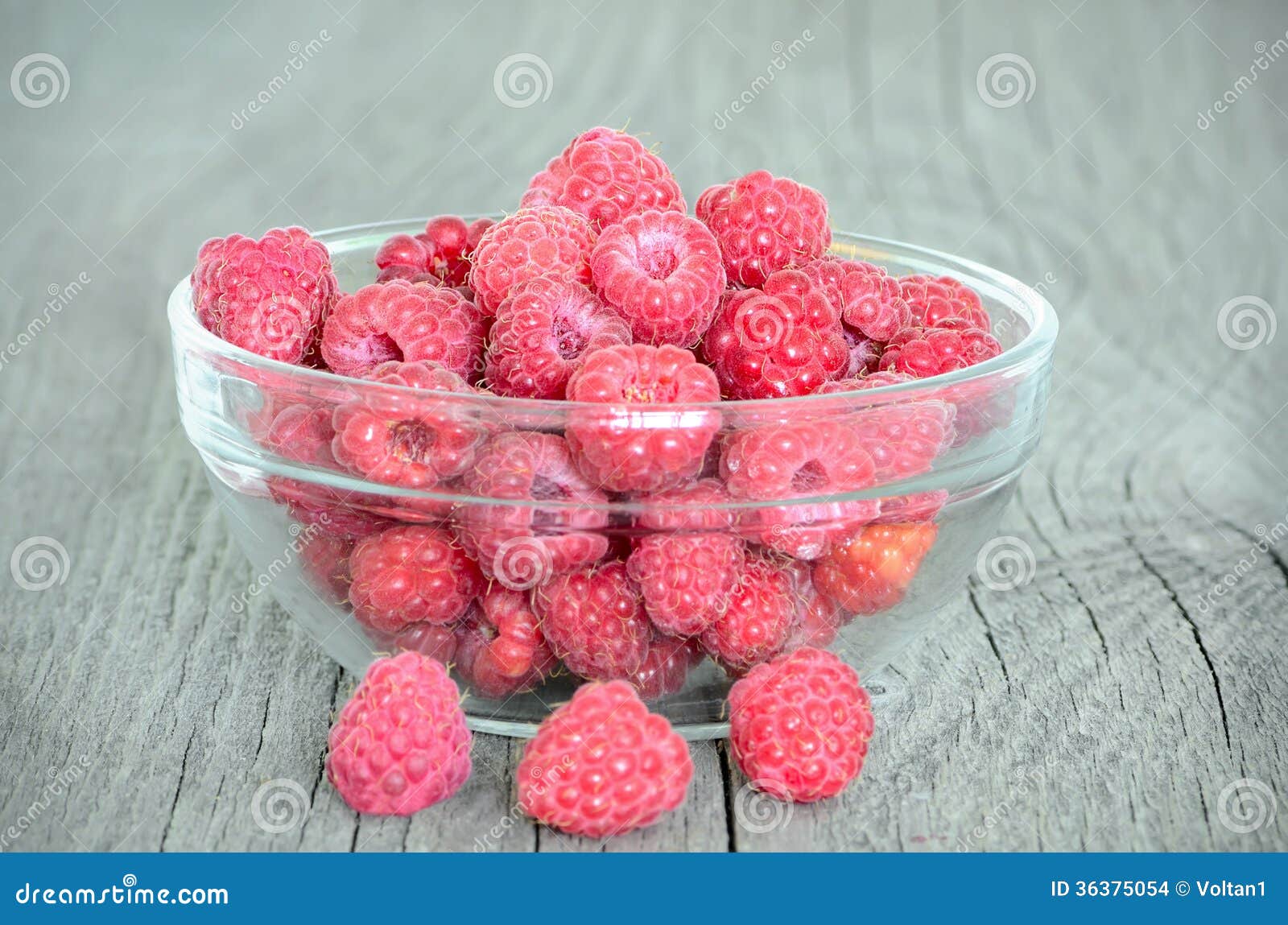 Raspberries in glass bowl stock photo. Image of ripe - 36375054