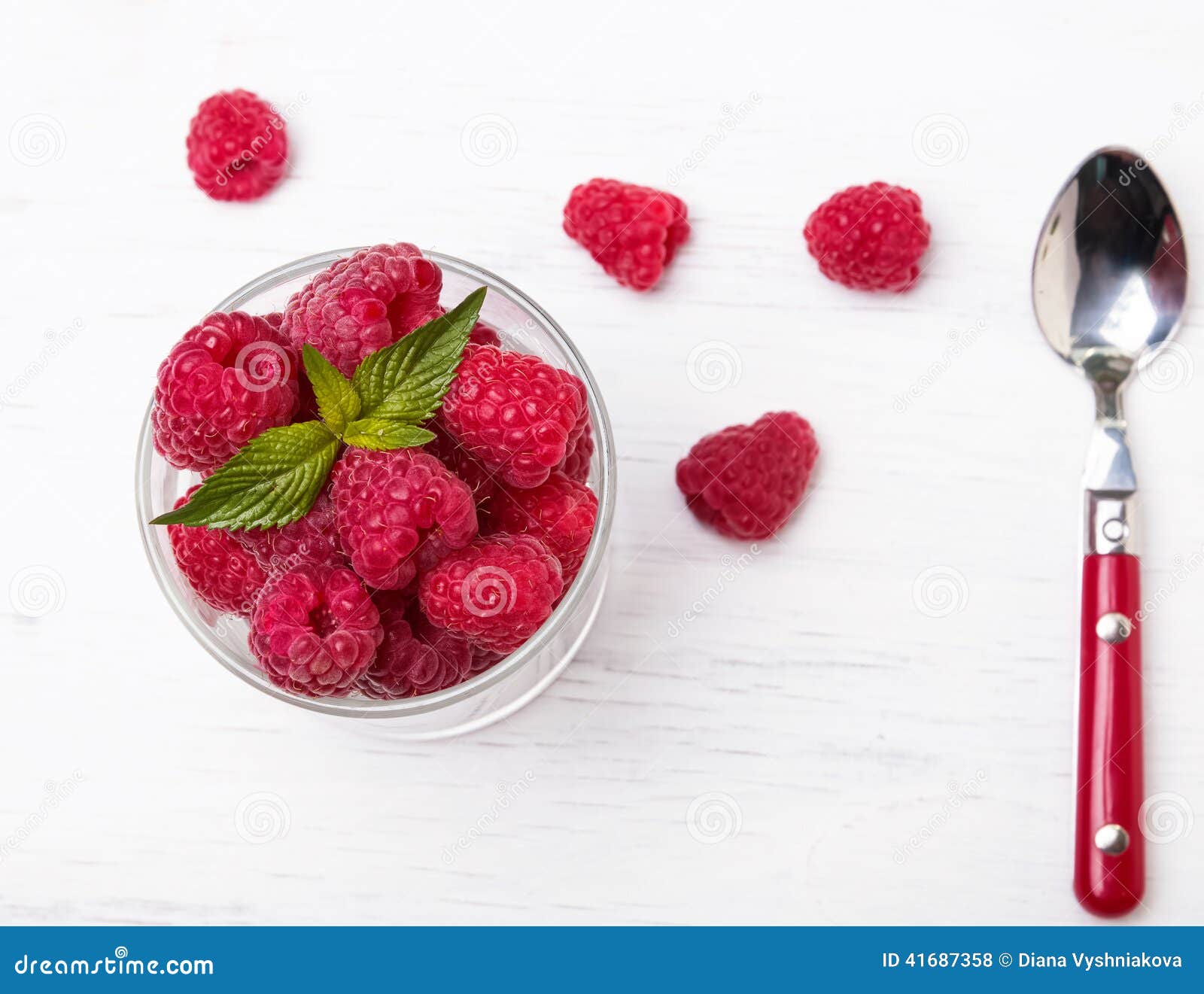 Raspberries in the glass stock photo. Image of isolated - 41687358
