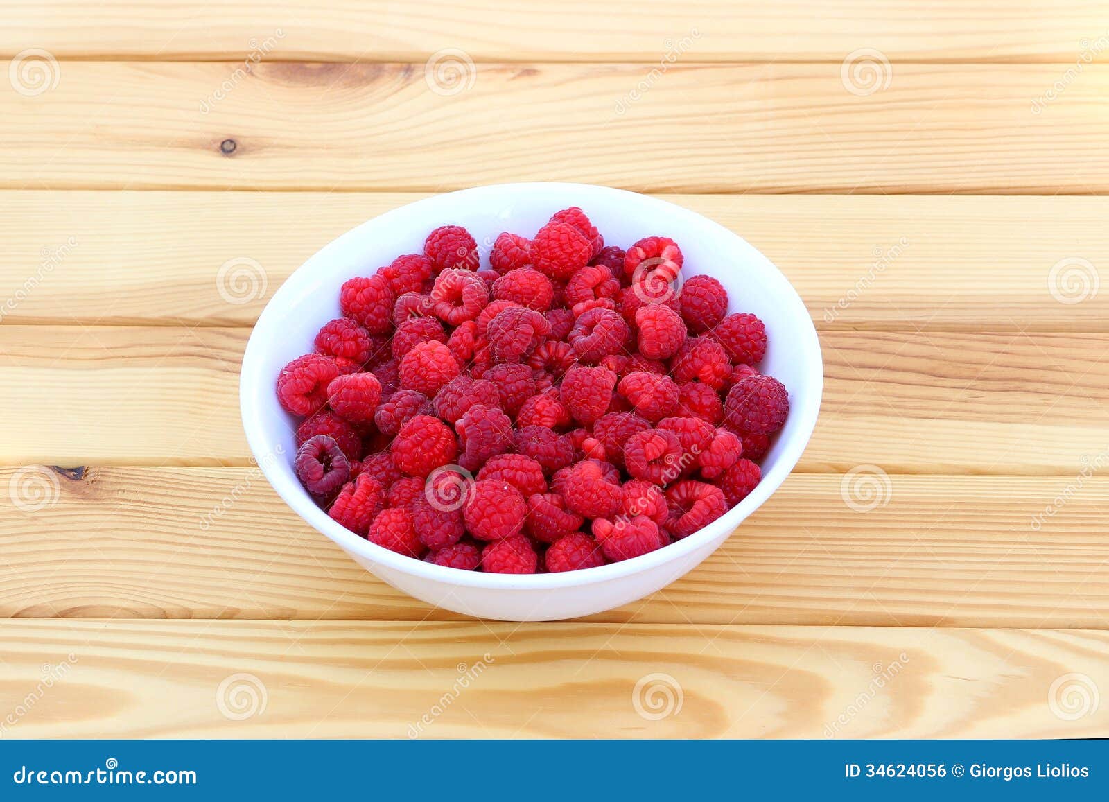 Raspberries in plate stock photo. Image of food, ripe - 34624056