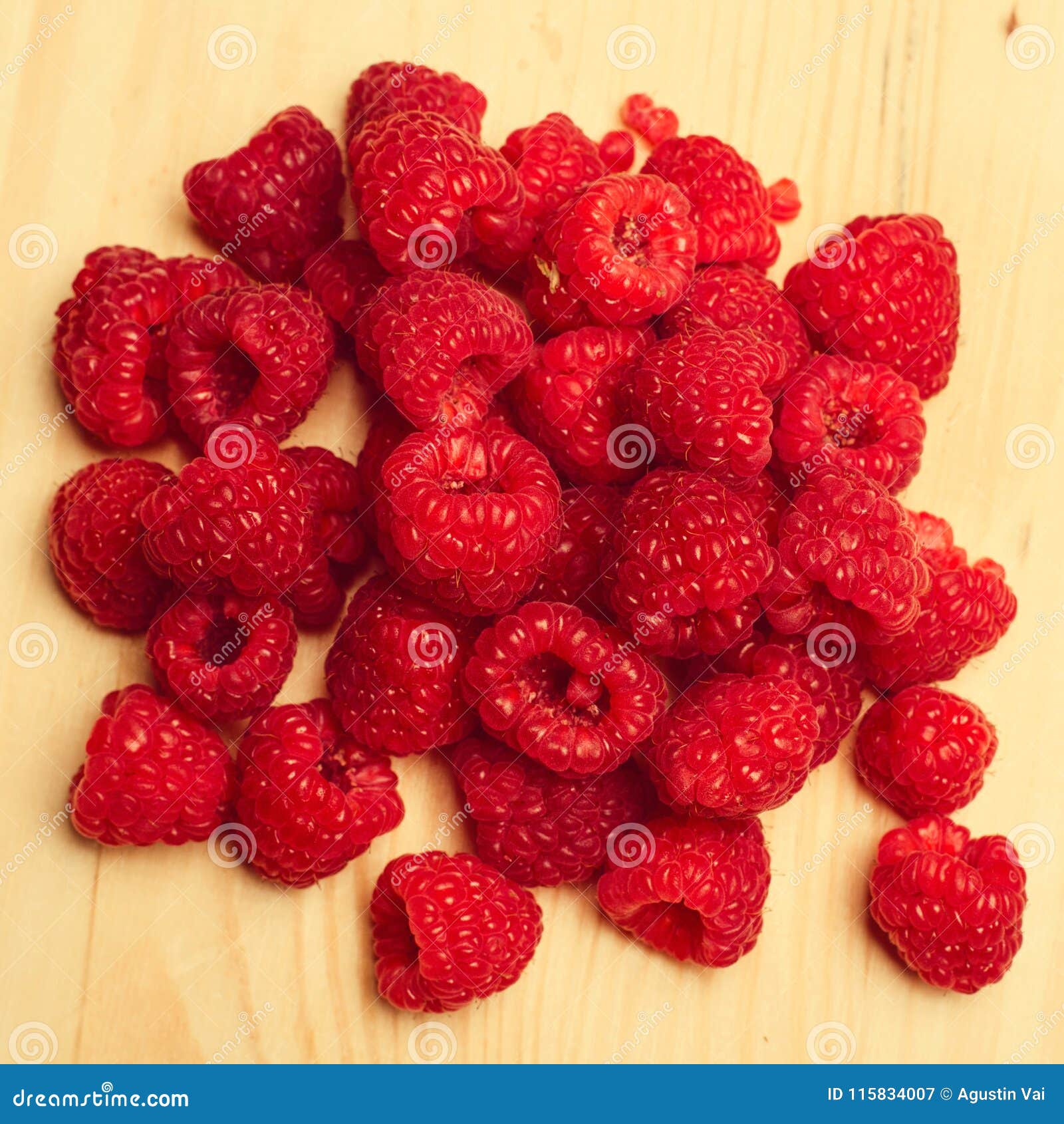 Raspberries on a plate stock image. Image of food, organic - 115834007