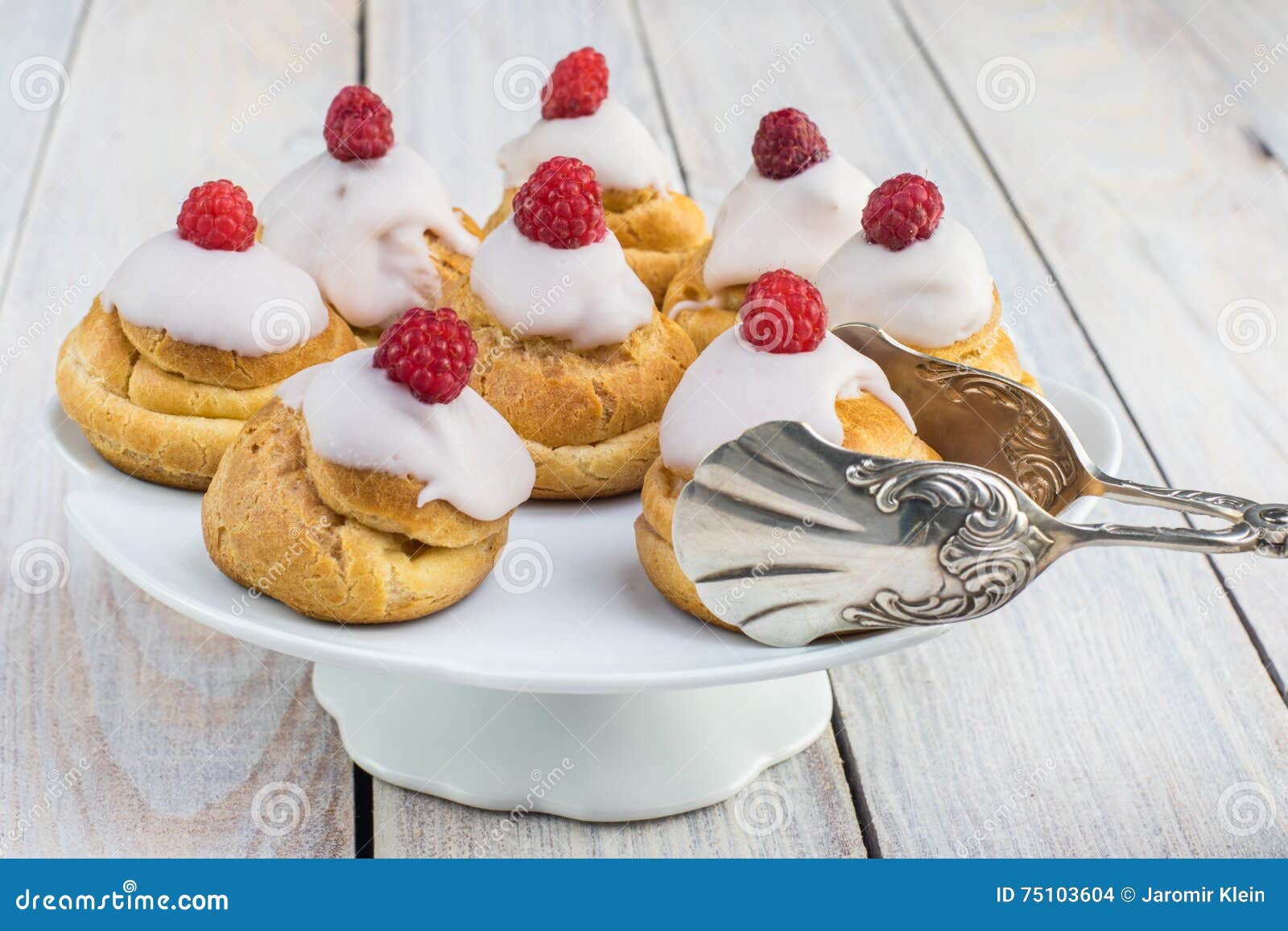 Raspberries Profiteroles with White Chocolate on White Plate Wit Stock ...