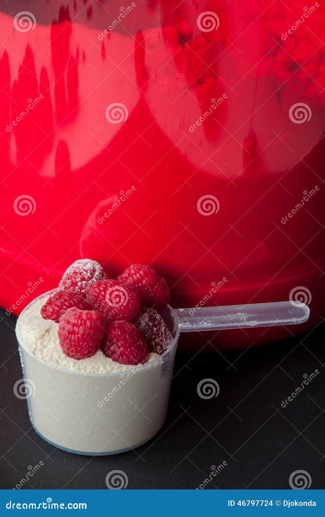 Raspberries in a Scoop of Protein Powder Stock Photo - Image of ...