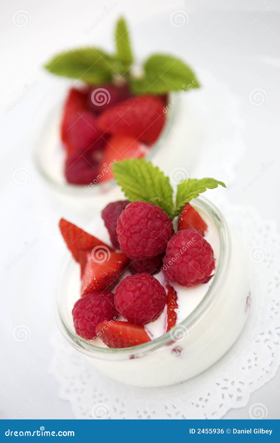 Raspberries and Strawberries Stock Photo - Image of diagonal, cream ...