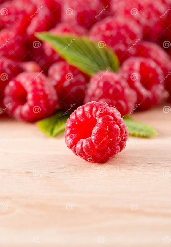 Raspberries on wood stock photo. Image of juicy, organic - 25004476