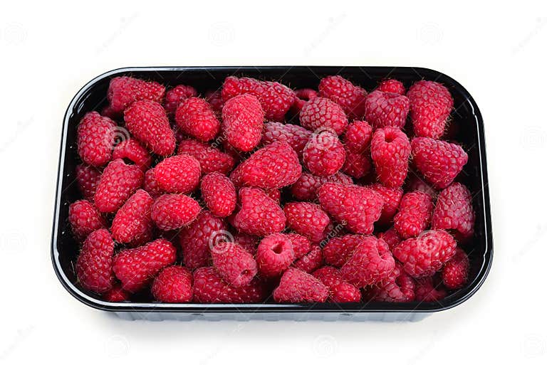 Raspberry in Black Container Isolated on White Background Stock Photo ...