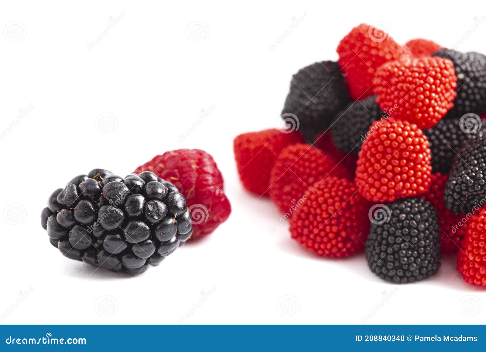 Raspberry and Blackberry Gummy Candies on a White Background Stock ...