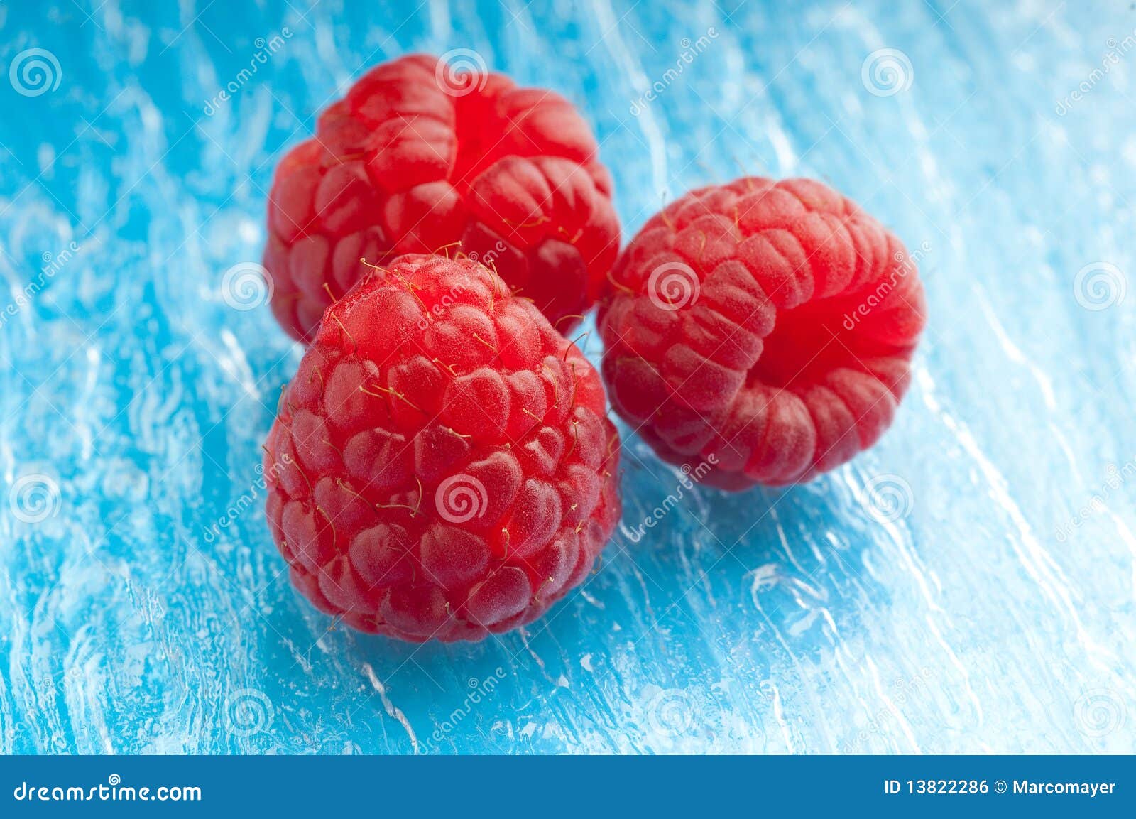 Raspberry on Blue Background Stock Photo - Image of salad, juicy: 13822286