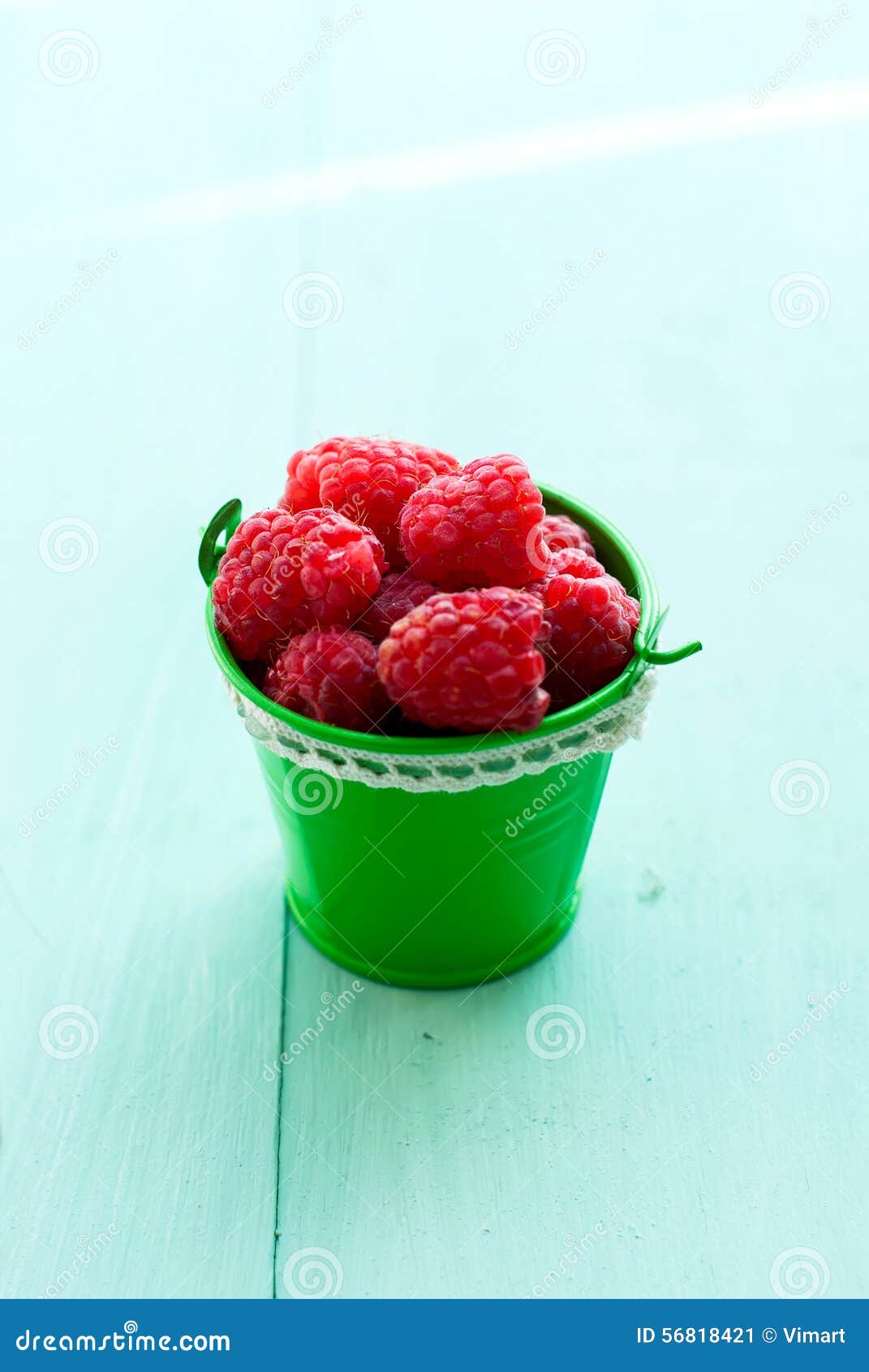 Raspberry in a bucket stock image. Image of berry, dessert - 56818421