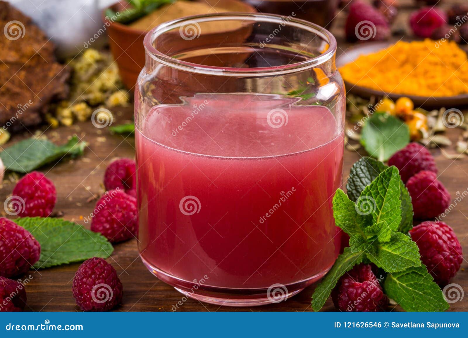 Raspberry Extract is Stirred in Water Stock Photo - Image of herb ...
