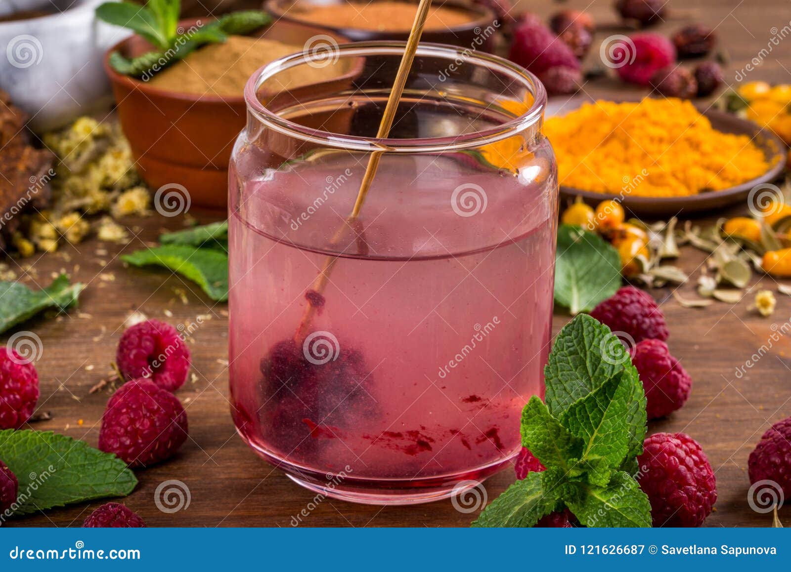Raspberry Extract is Stirred in Water Stock Image - Image of medical ...