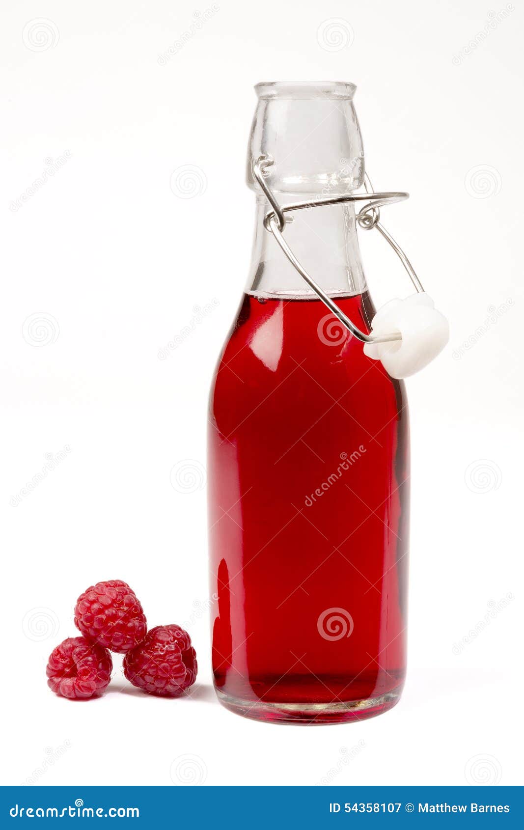 Raspberry Fruit Drink in Glass Bottle Stock Image - Image of background ...
