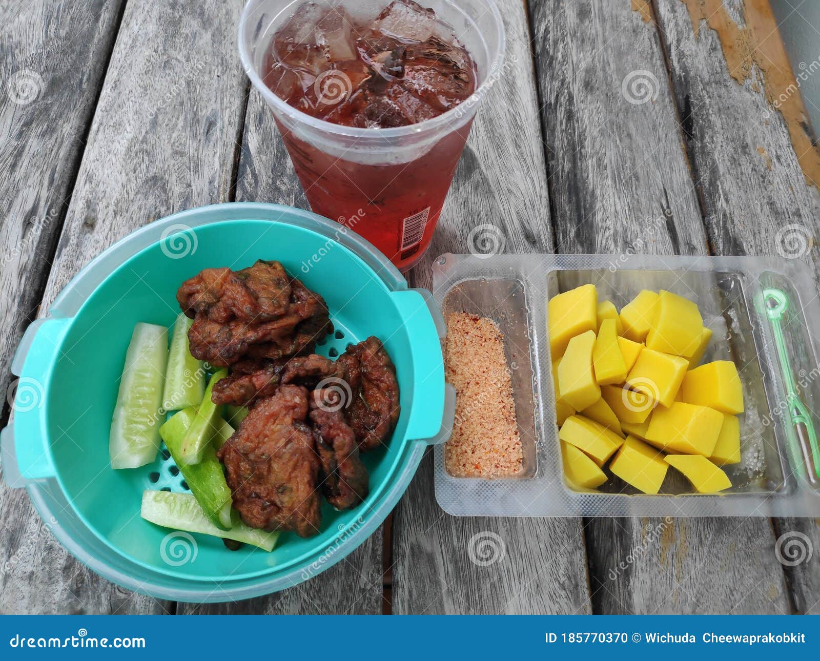 Raspberry Iced Tea with Fish Cake and Pickled Mango. Stock Photo ...