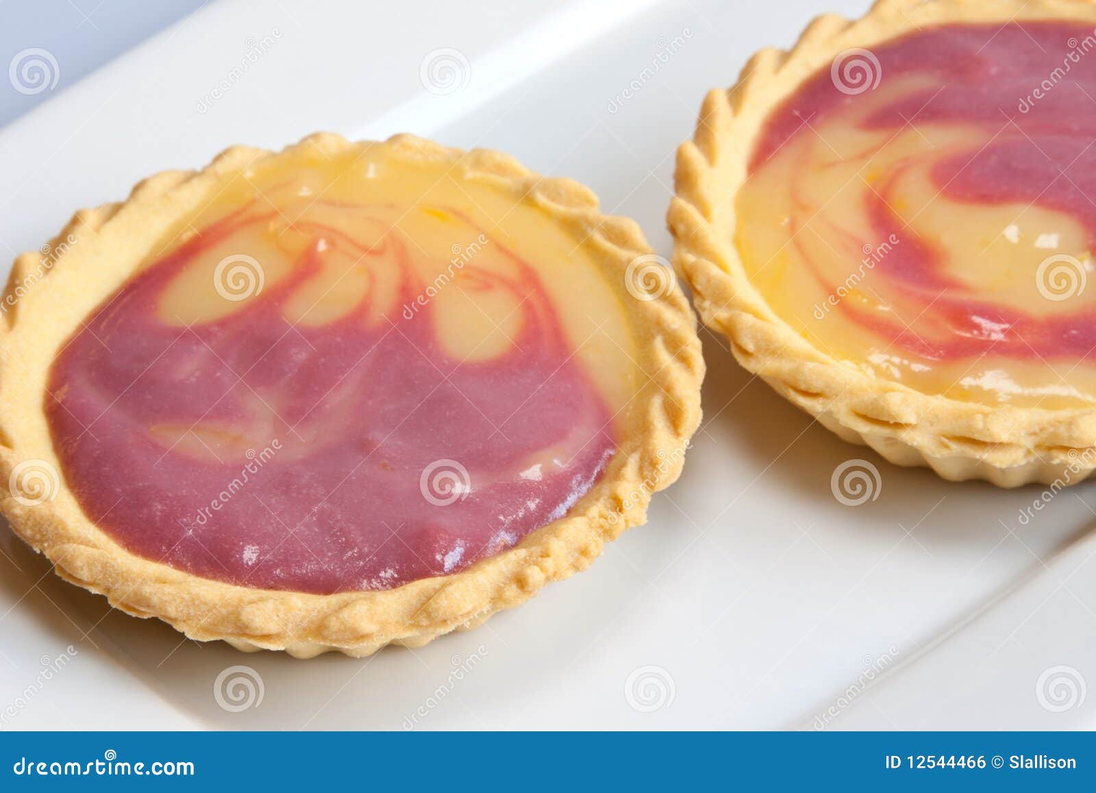 Raspberry & Lemon Curd Tarts Stock Photo - Image of berries, spiral ...