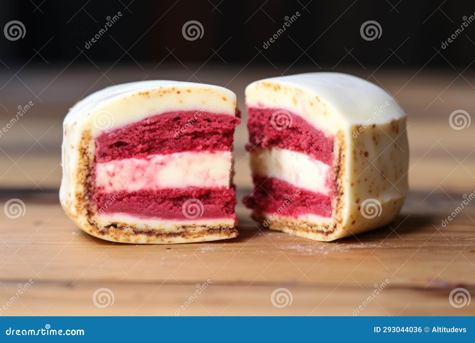 Raspberry Macaron Cut in Half on a Wooden Table Stock Photo - Image of ...