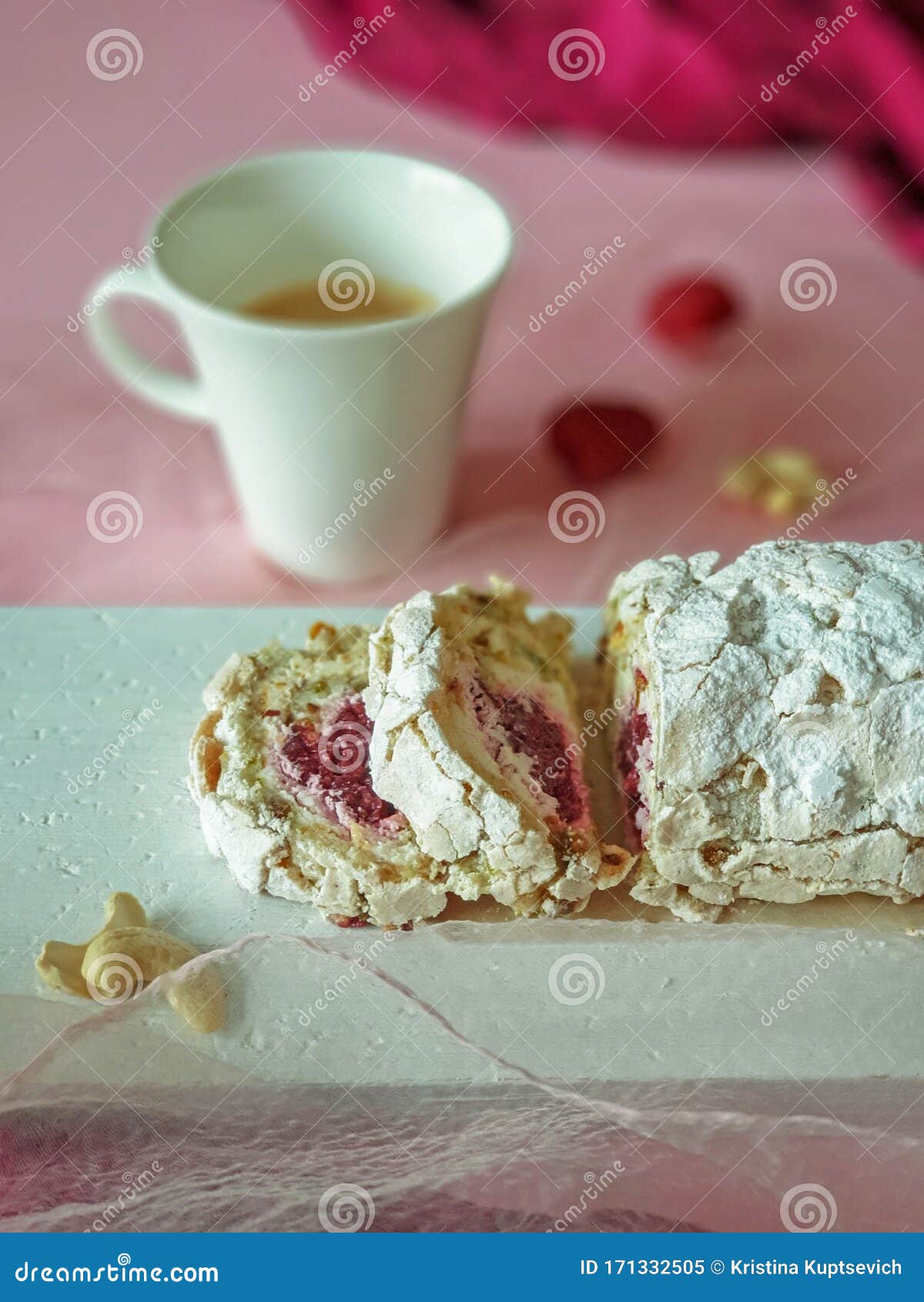 Raspberry Nut Cake with Two Cut Pieces and a Cup of Coffee on a Pink ...