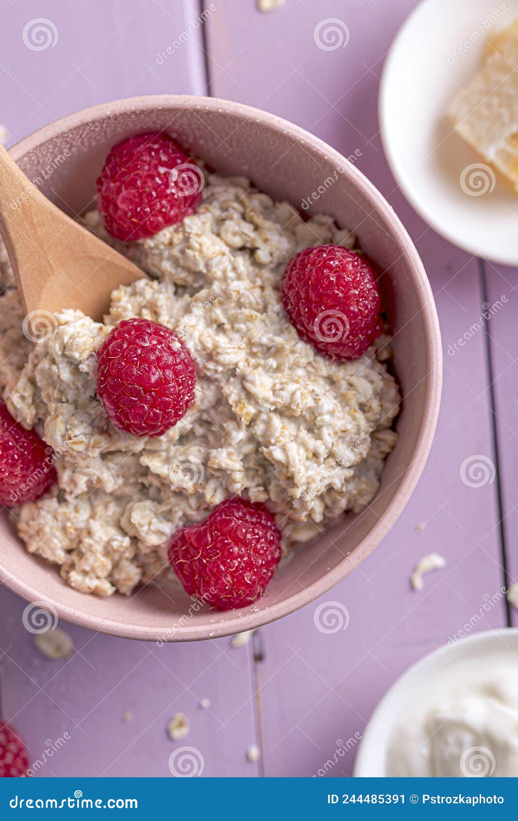 Raspberry Porridge with the Addition of Honey and Yogurt Stock Image ...