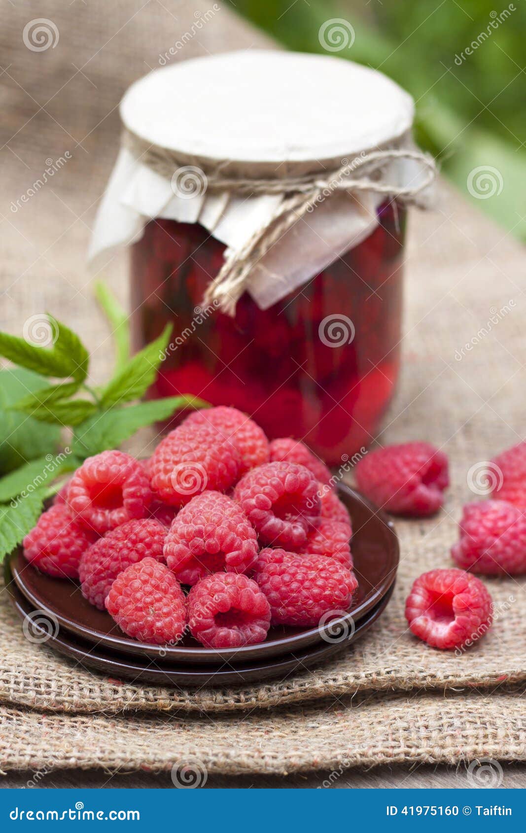 Raspberry Preserve in Glass Jar and Fresh Raspberries Stock Photo ...