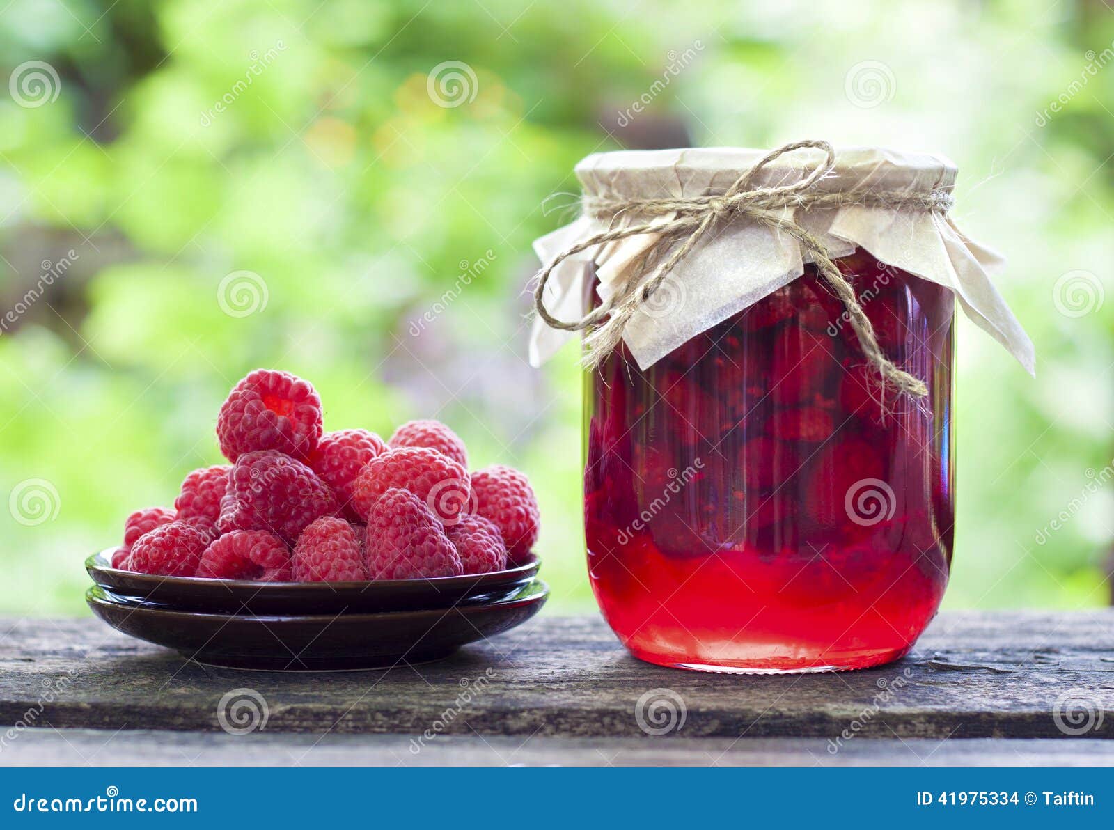 Raspberry Preserve in Glass Jar and Fresh Raspberries Stock Photo ...