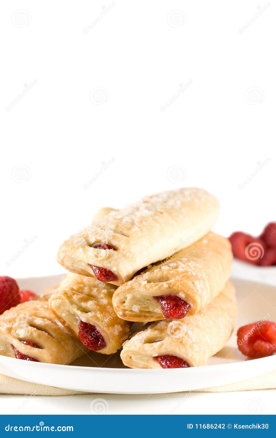 Raspberry Sticks Pastry on White Plate Stock Photo - Image of products ...