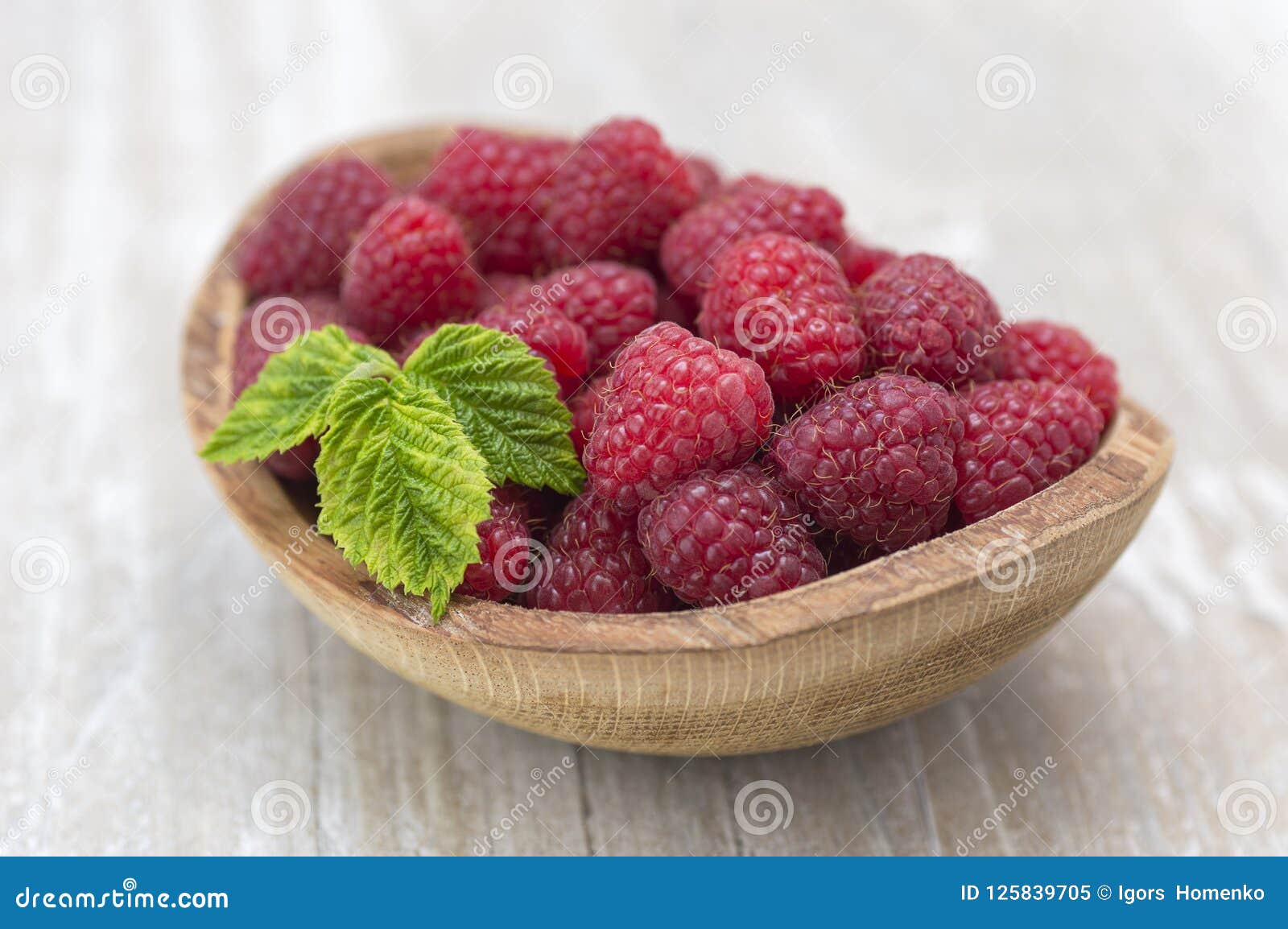 Raspberry in a Wooden Plate. Stock Image - Image of wooden, table ...