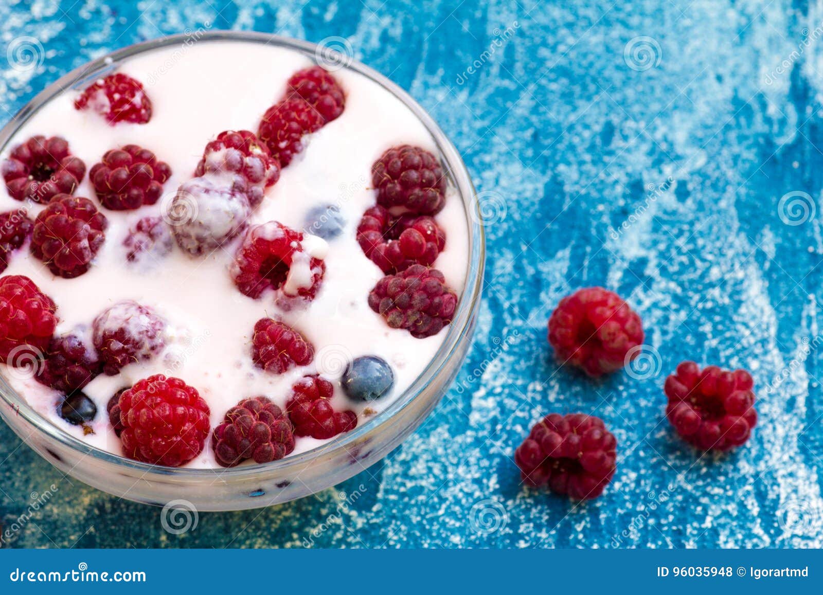 Raspberry with yogurt stock photo. Image of raspberries - 96035948