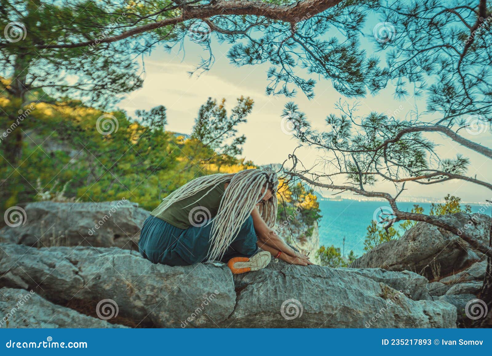 Rasta Girl with Dreadlocks Resting on the Mediterranean Coast Stock ...