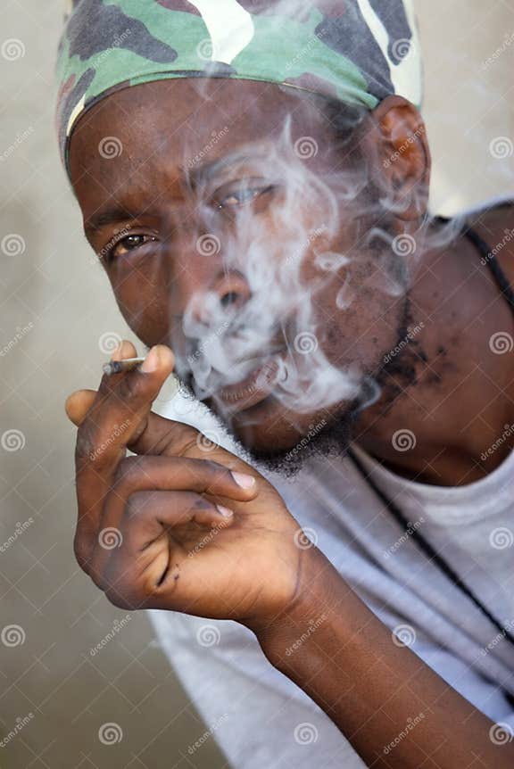 Rastafarian Smoking Cannabis Stock Photo - Image of reggae, colorful ...