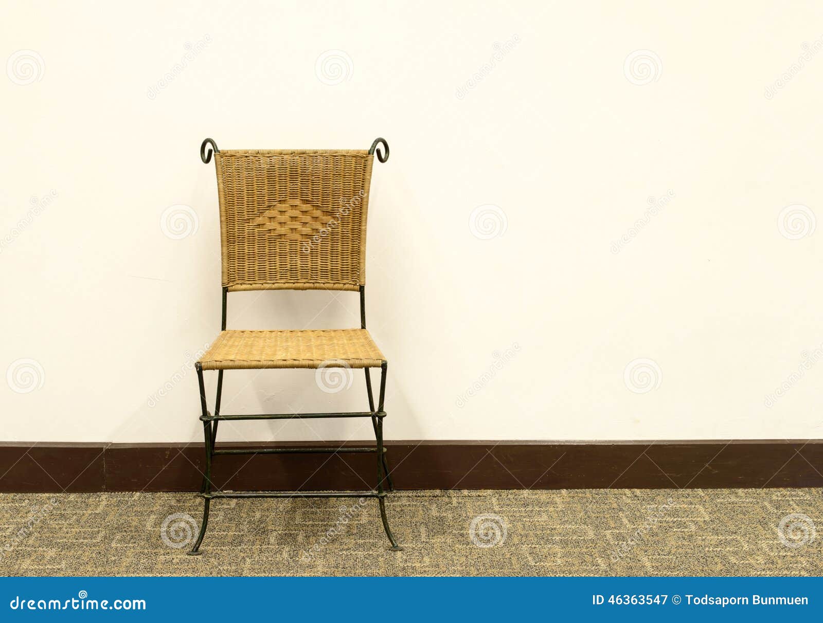 Rattan Chair Against a White Wall Stock Image - Image of relaxation ...