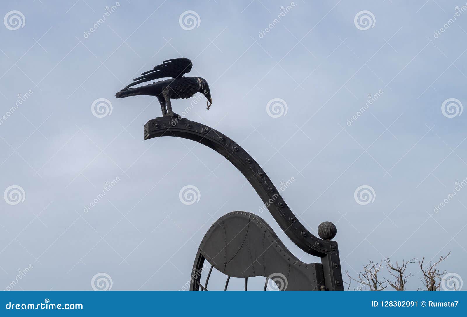 Raven Carrying a Gold Ring on Corvin Gate on St. George Square of Royal ...