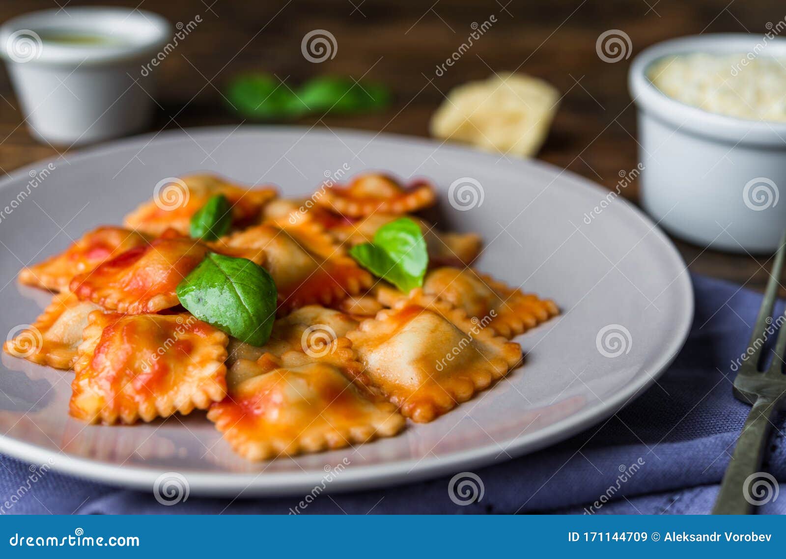 Ravioli Stuffed Pasta with Tomato Sauce and Basil. Stock Image - Image ...