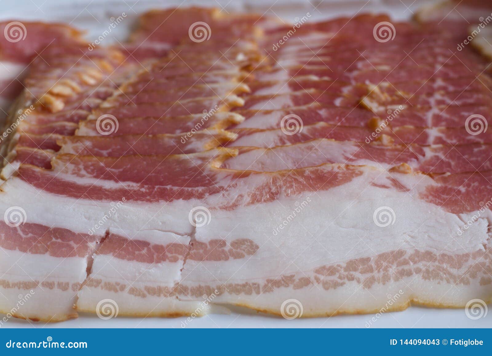 Raw bacon slices stock image. Image of portion, delicious - 144094043
