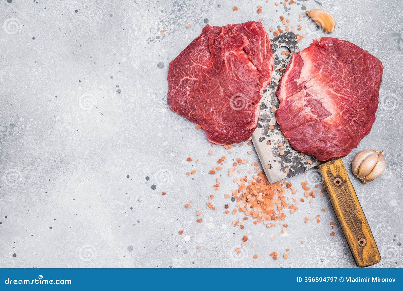 Raw Beef Cheeks on Butcher Meat Cleaver. Grey Background Stock Image ...