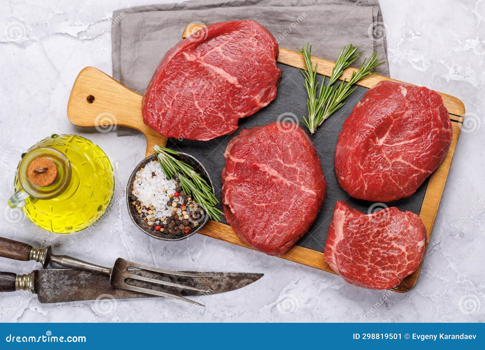 Raw Beef Fillet Steaks on a Cutting Board, Fresh and Uncooked Stock ...