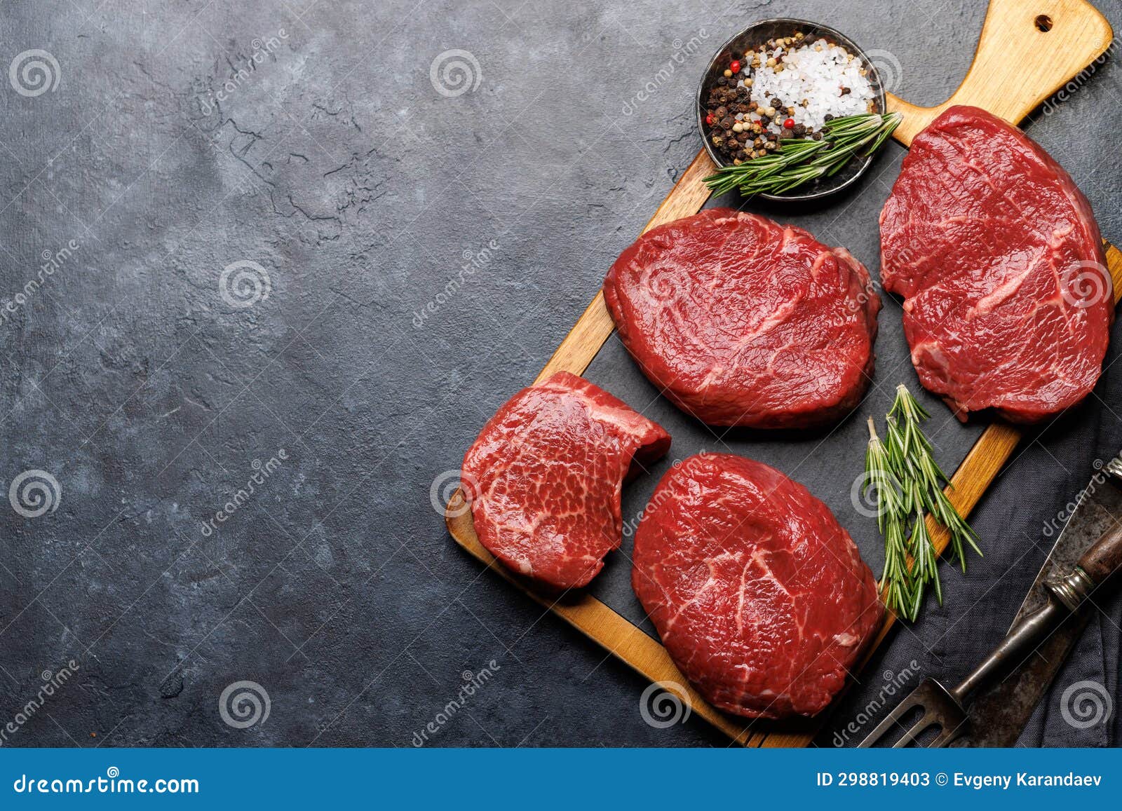 Raw Beef Fillet Steaks on a Cutting Board, Fresh and Uncooked Stock ...