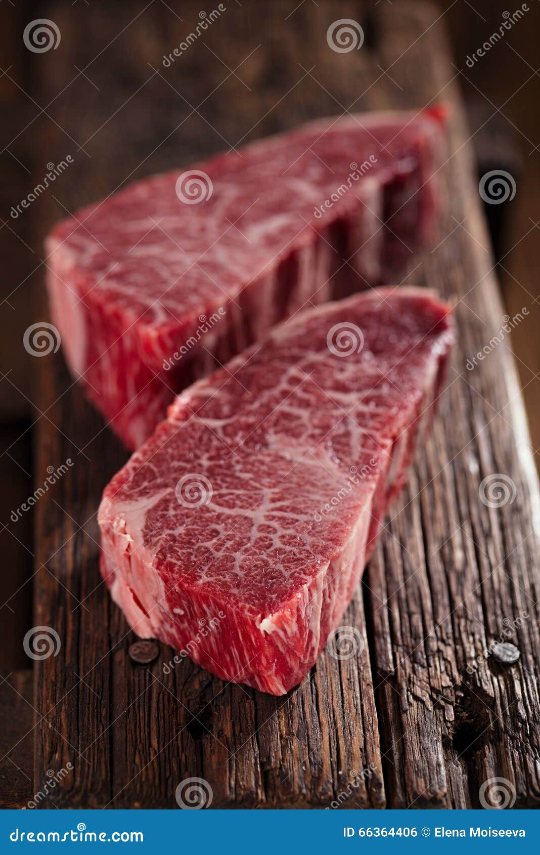 Raw Beef Marbled Steak with Vintage Background Stock Photo - Image of ...