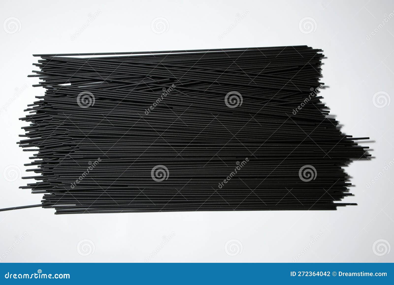 Raw black spaghetti pasta stock photo. Image of delicious - 272364042