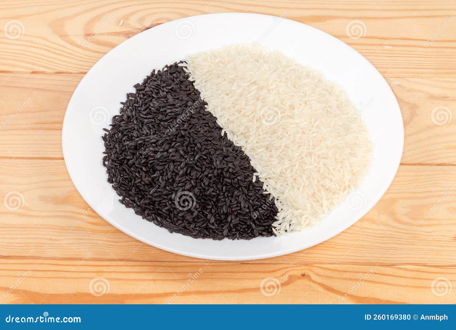 Raw Black and White Rice on Dish on Rustic Table Stock Photo - Image of ...