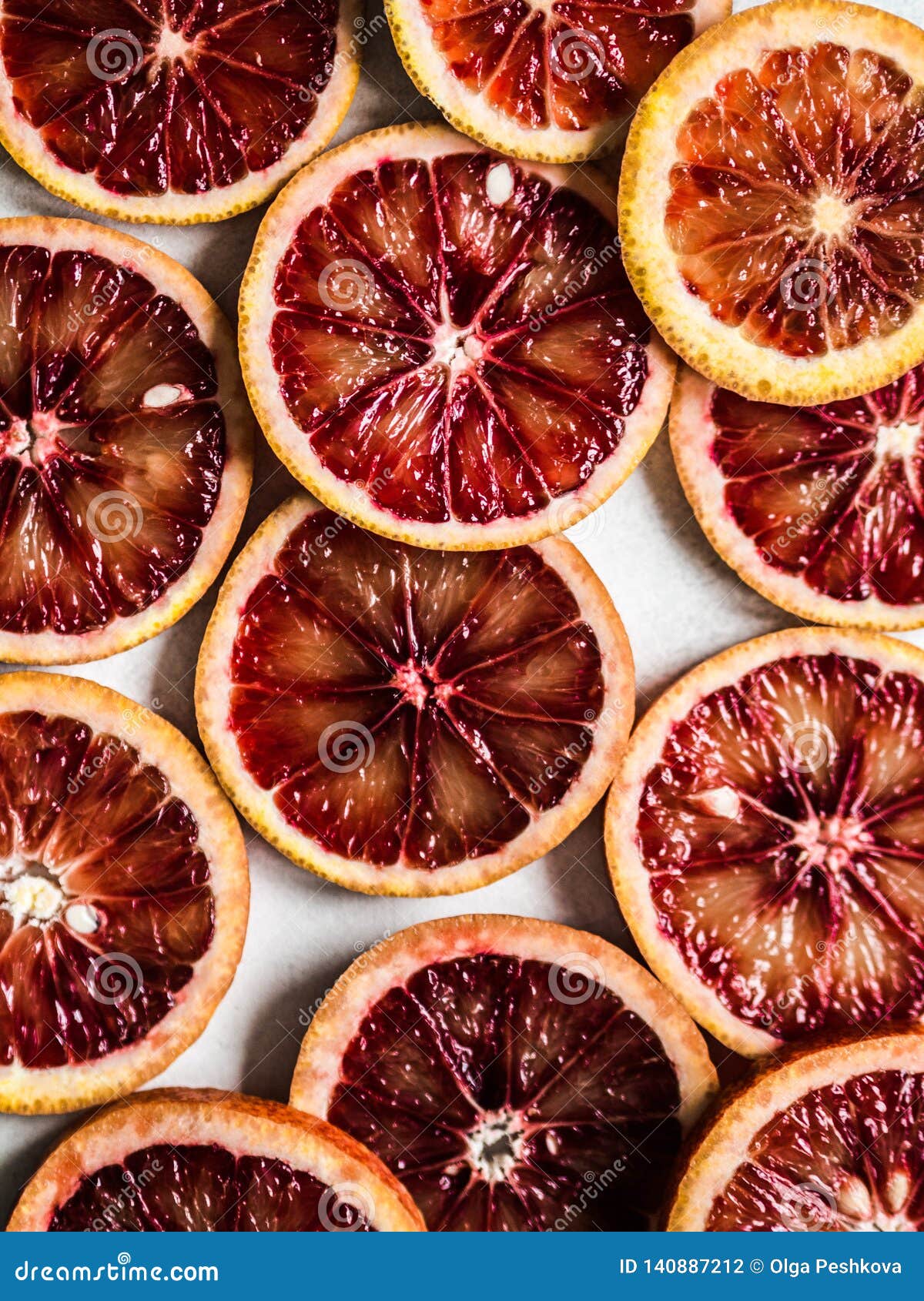 Raw Blood Red Orange Slice on a Light Background. Citrus Background ...