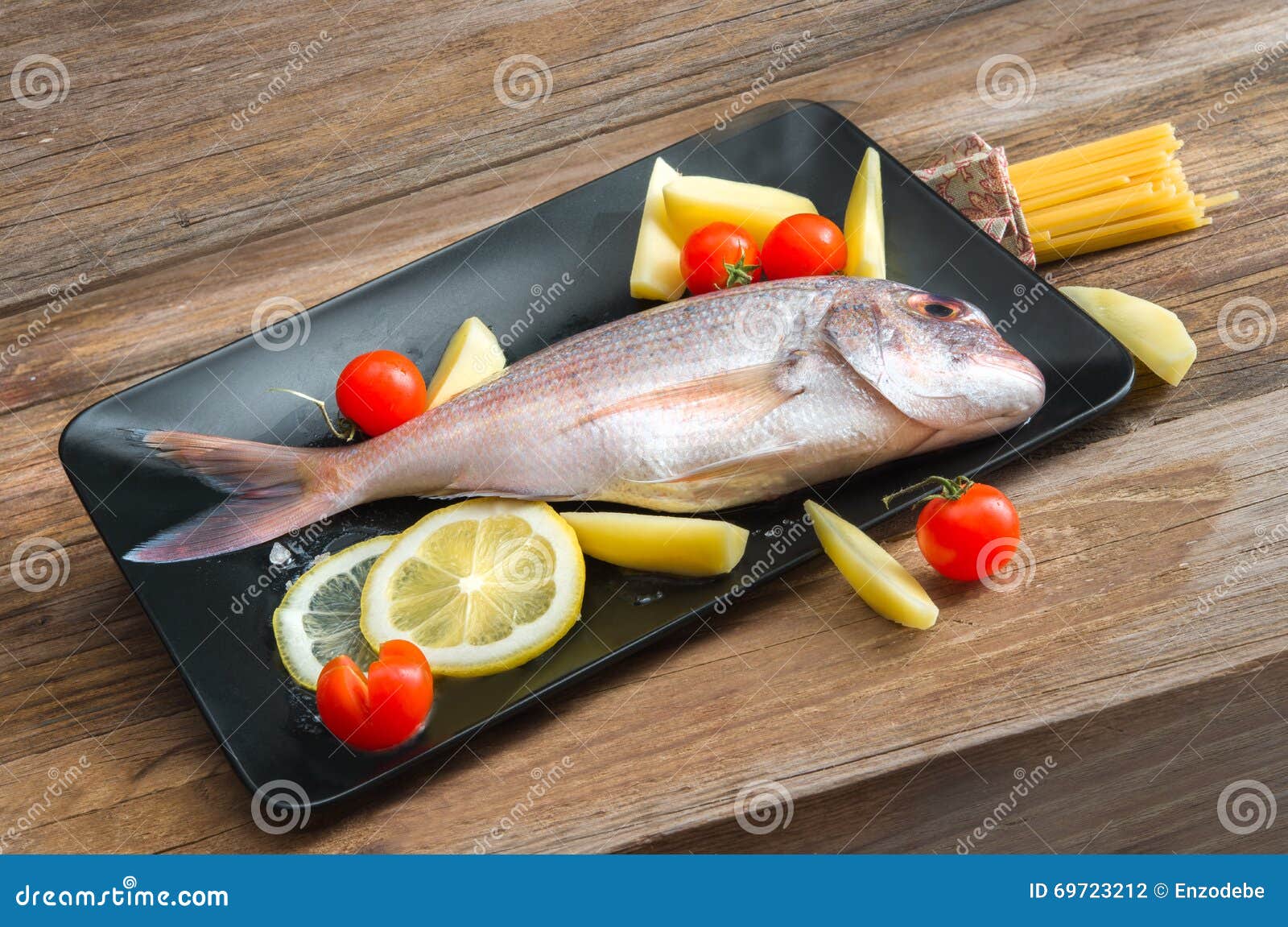 Raw bream on plate stock photo. Image of food, bream - 69723212