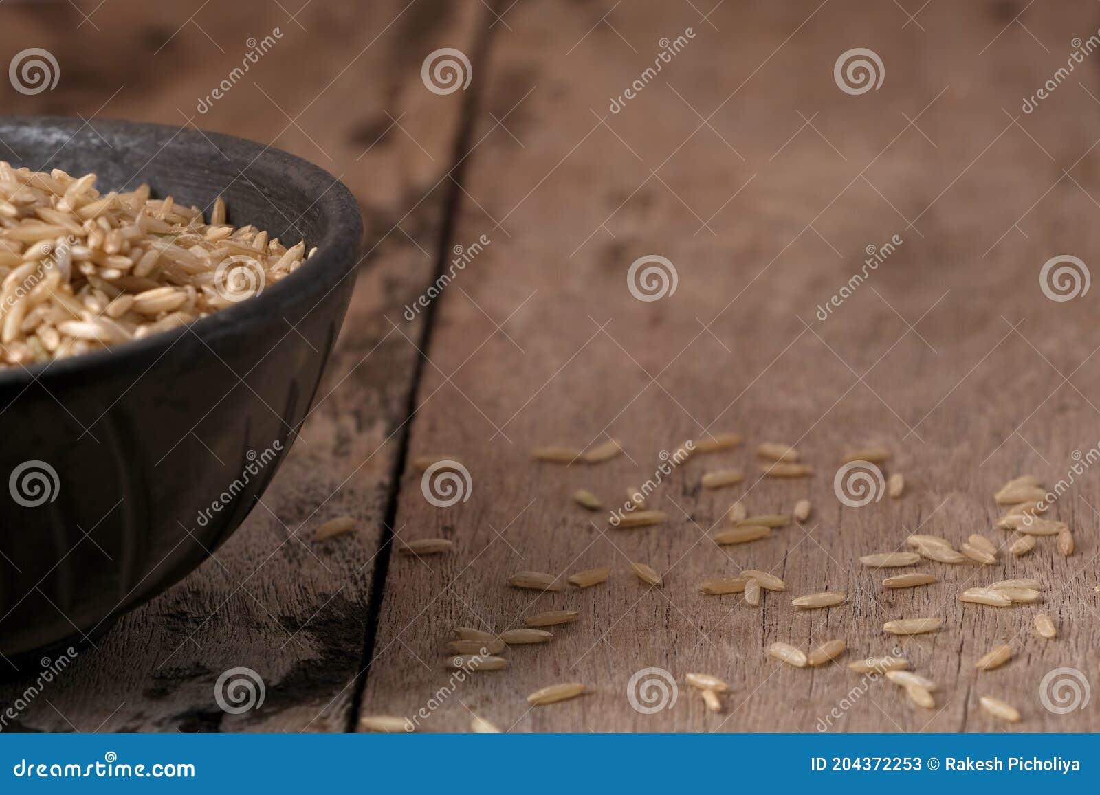 Raw Brown Rice Fall Down from Bowl Stock Image - Image of isolated ...