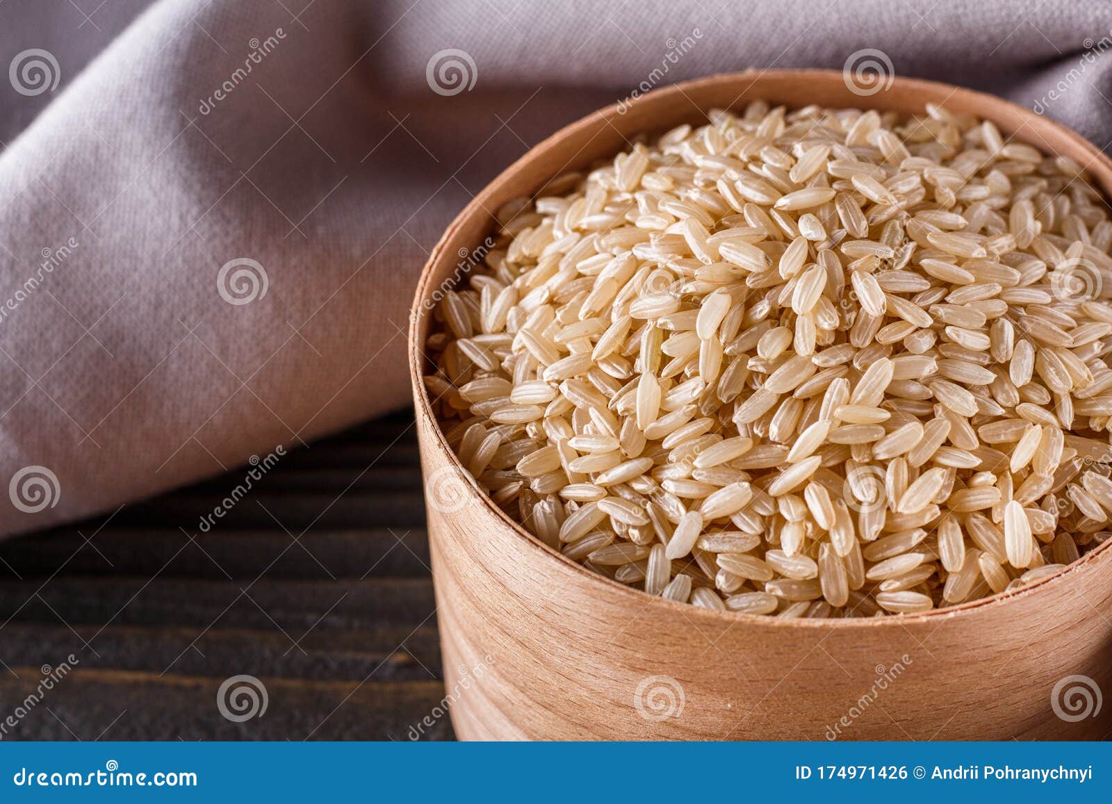 Raw Brown Rice on Dark Rustic Wooden Background Stock Photo - Image of ...