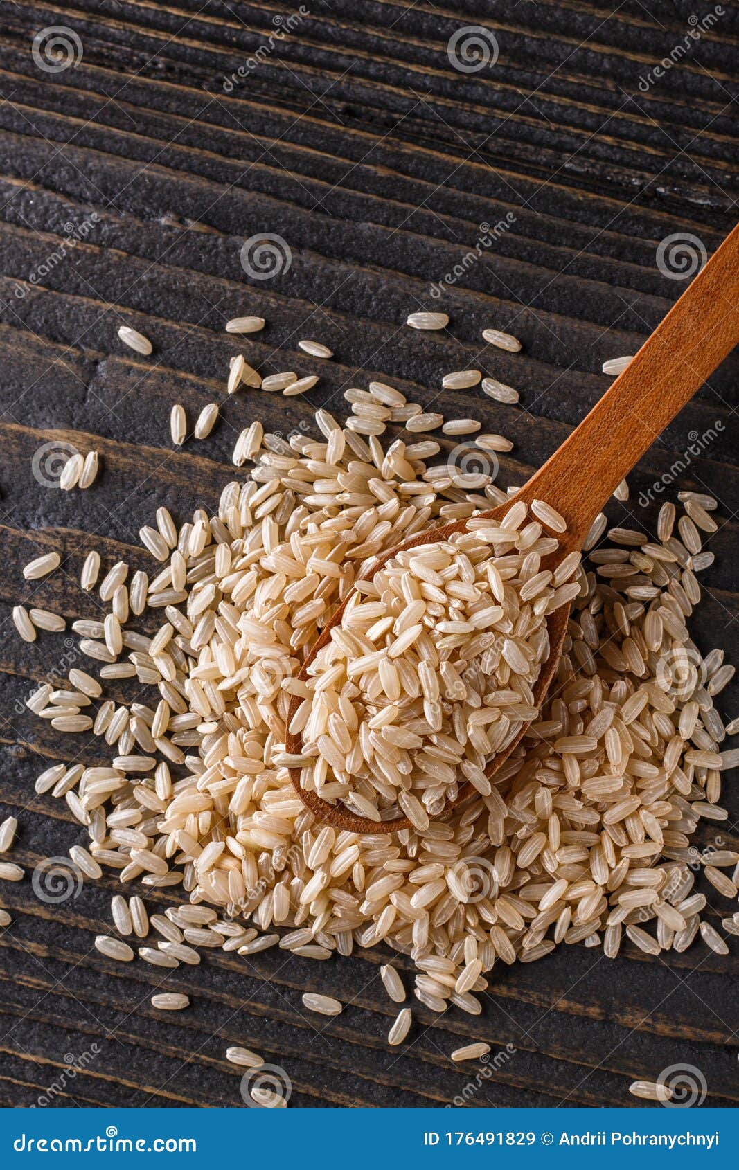 Raw Brown Rice on Dark Rustic Wooden Background Stock Image - Image of ...