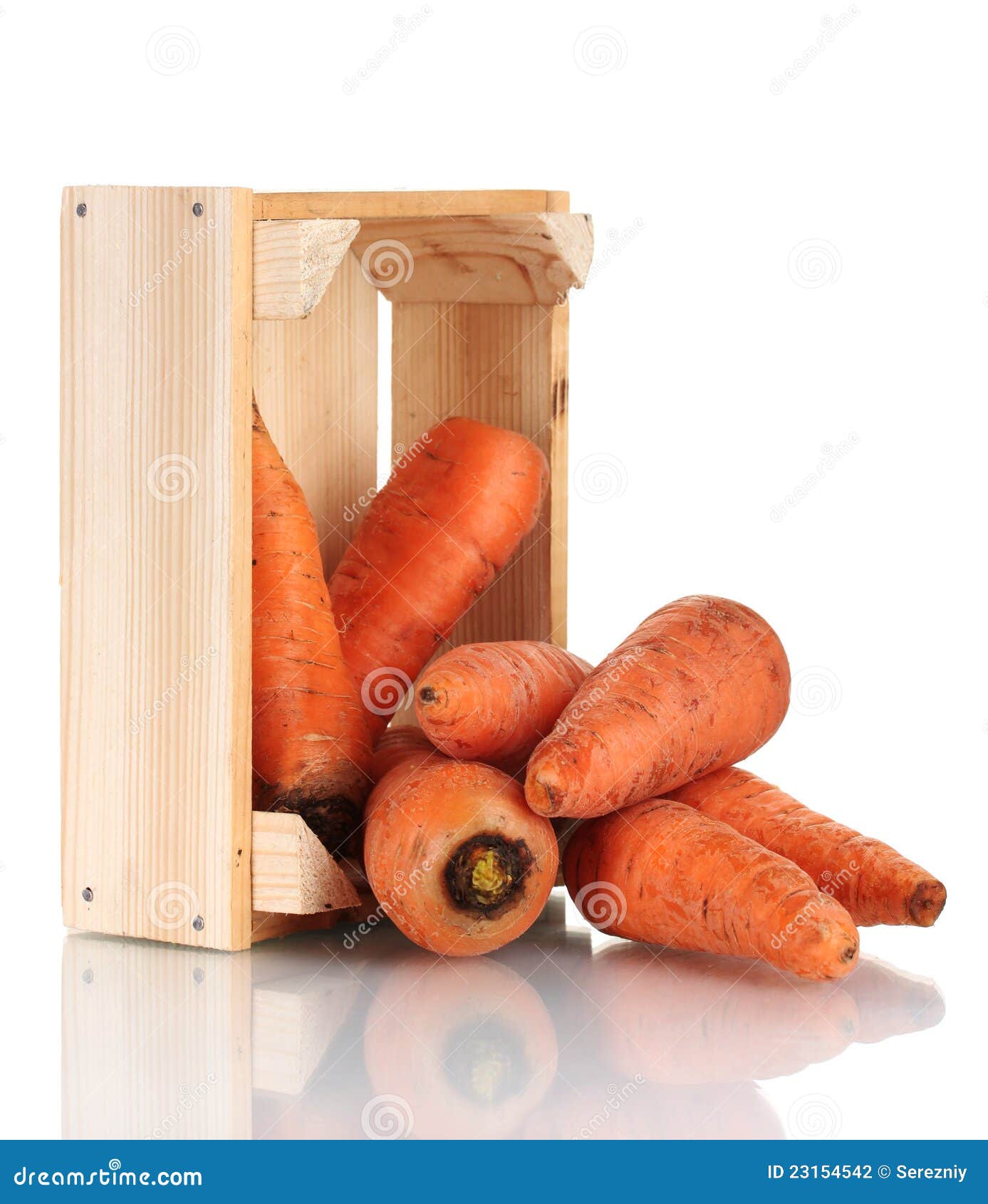 Raw carrots in wooden box stock photo. Image of food - 23154542
