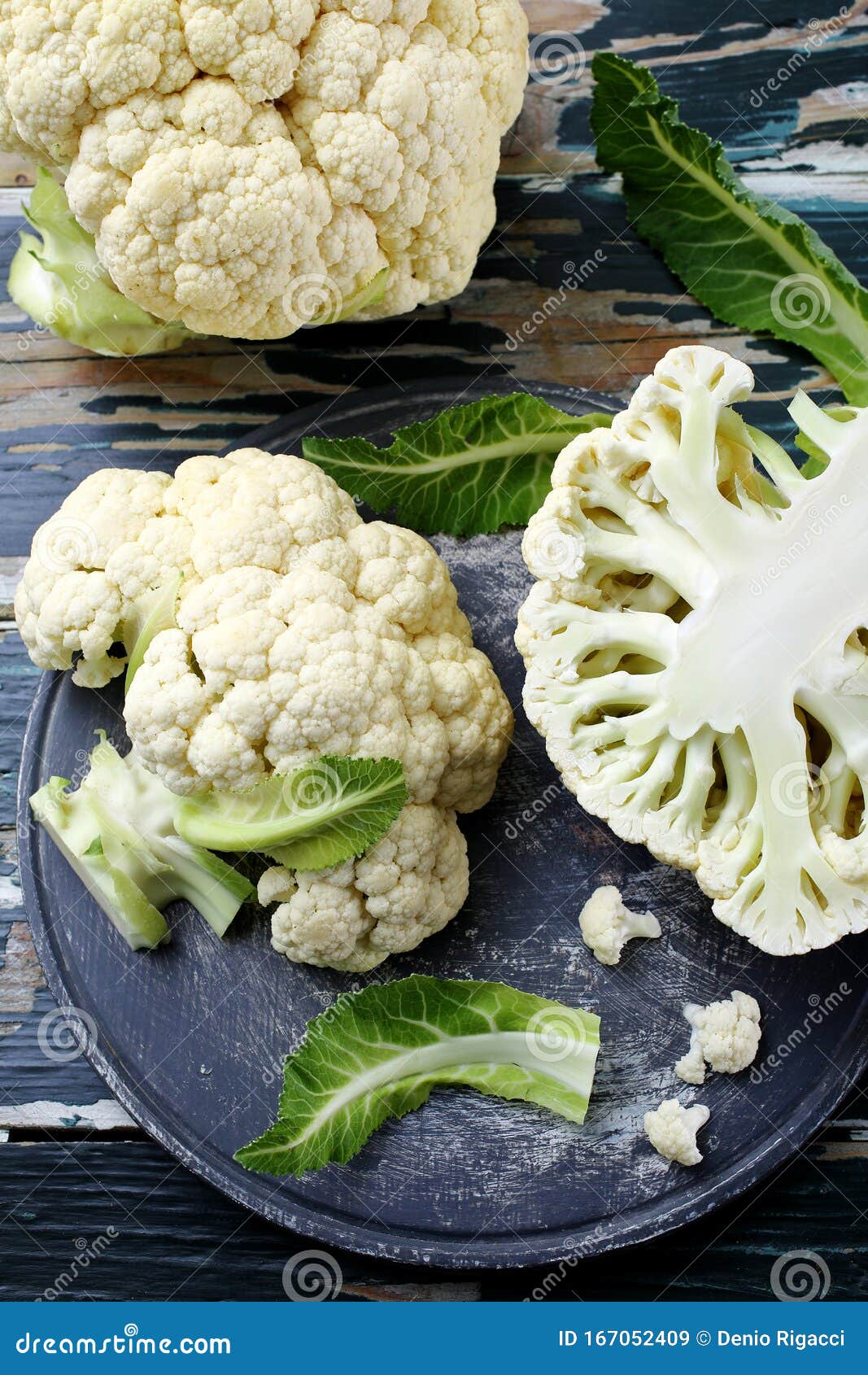 Raw cauliflower in kitchen stock image. Image of shot - 167052409